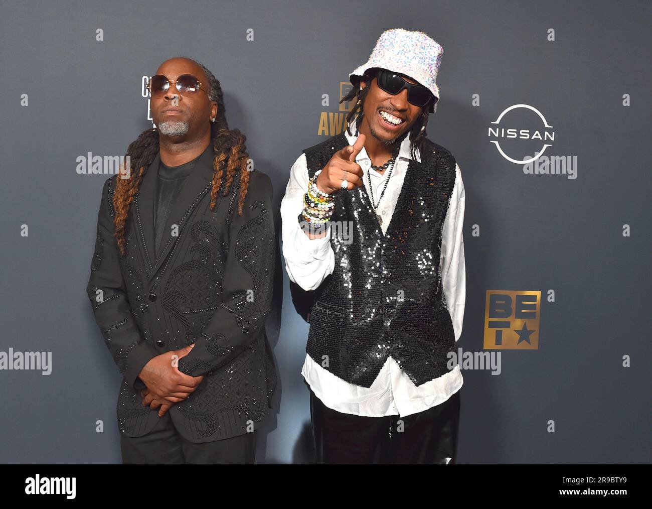 Kaine, left, and D-Roc of Ying Yang Twins pose in the press room at the ...