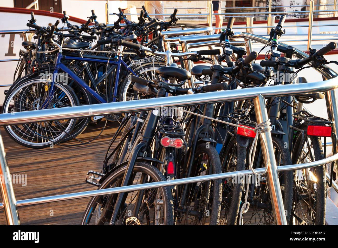 Group of bicycles being transported on a deck of a ship Stock Photo - Alamy