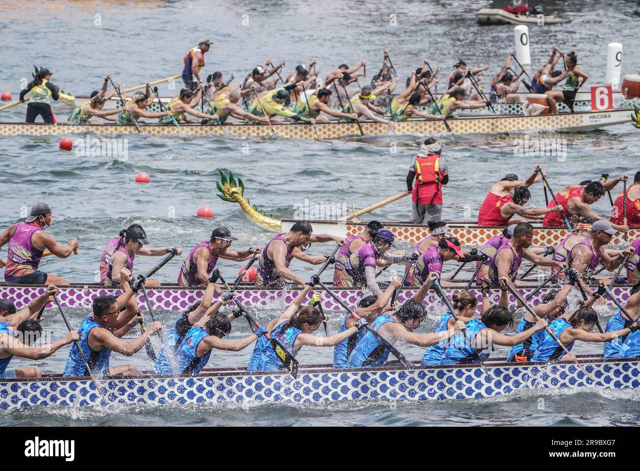 Participants compete in a dragon boat race at the Victoria Harbour. The ...