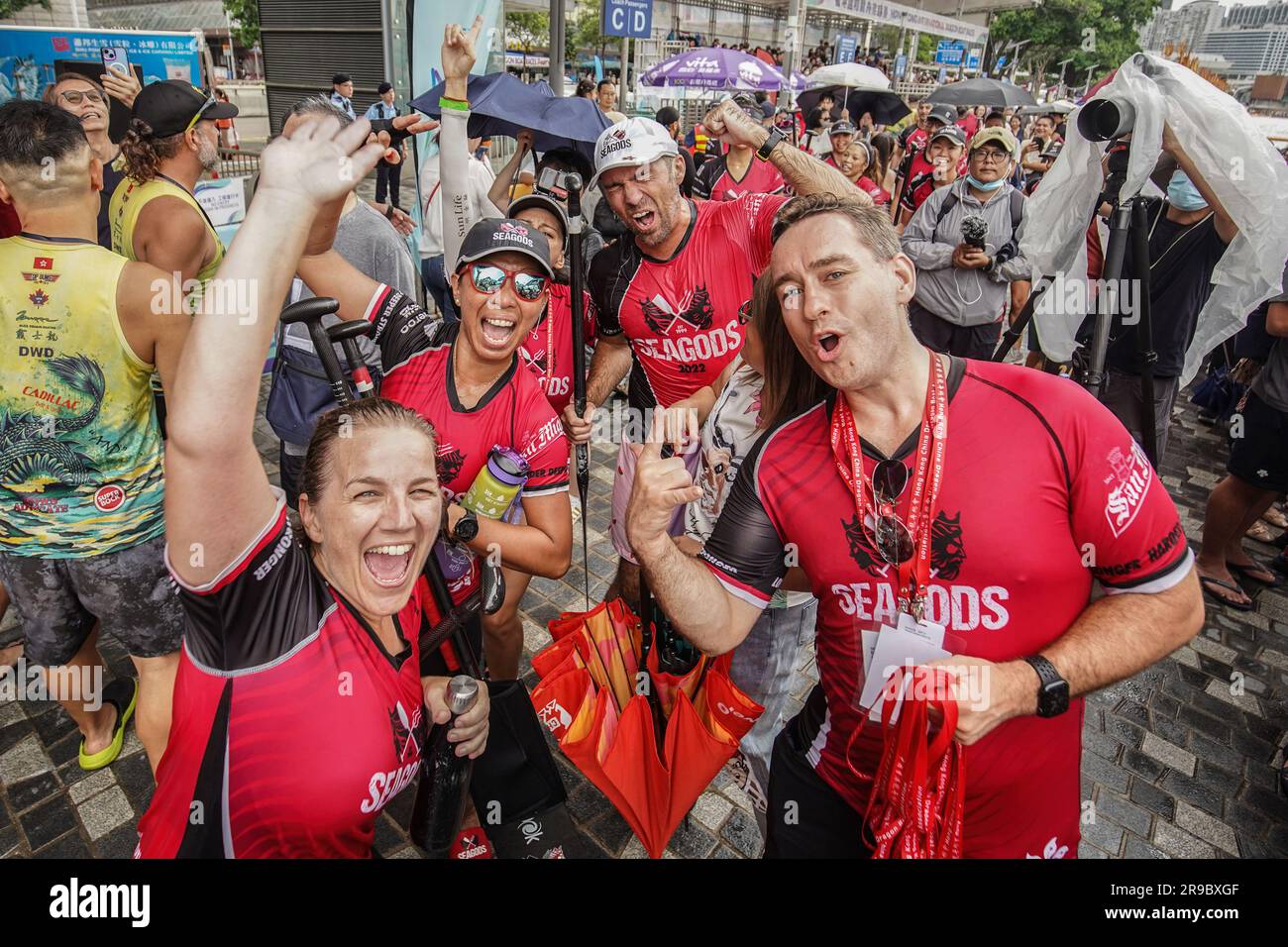 Participants celebrate at the Tsim Sha Tsui East Waterfront after ...
