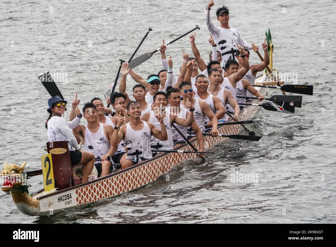Participants compete in a dragon boat race at the Victoria Harbour. The ...