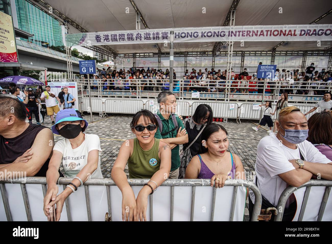 People gather at Tsim Sha Tsui East Waterfront to watch the dragon boat ...