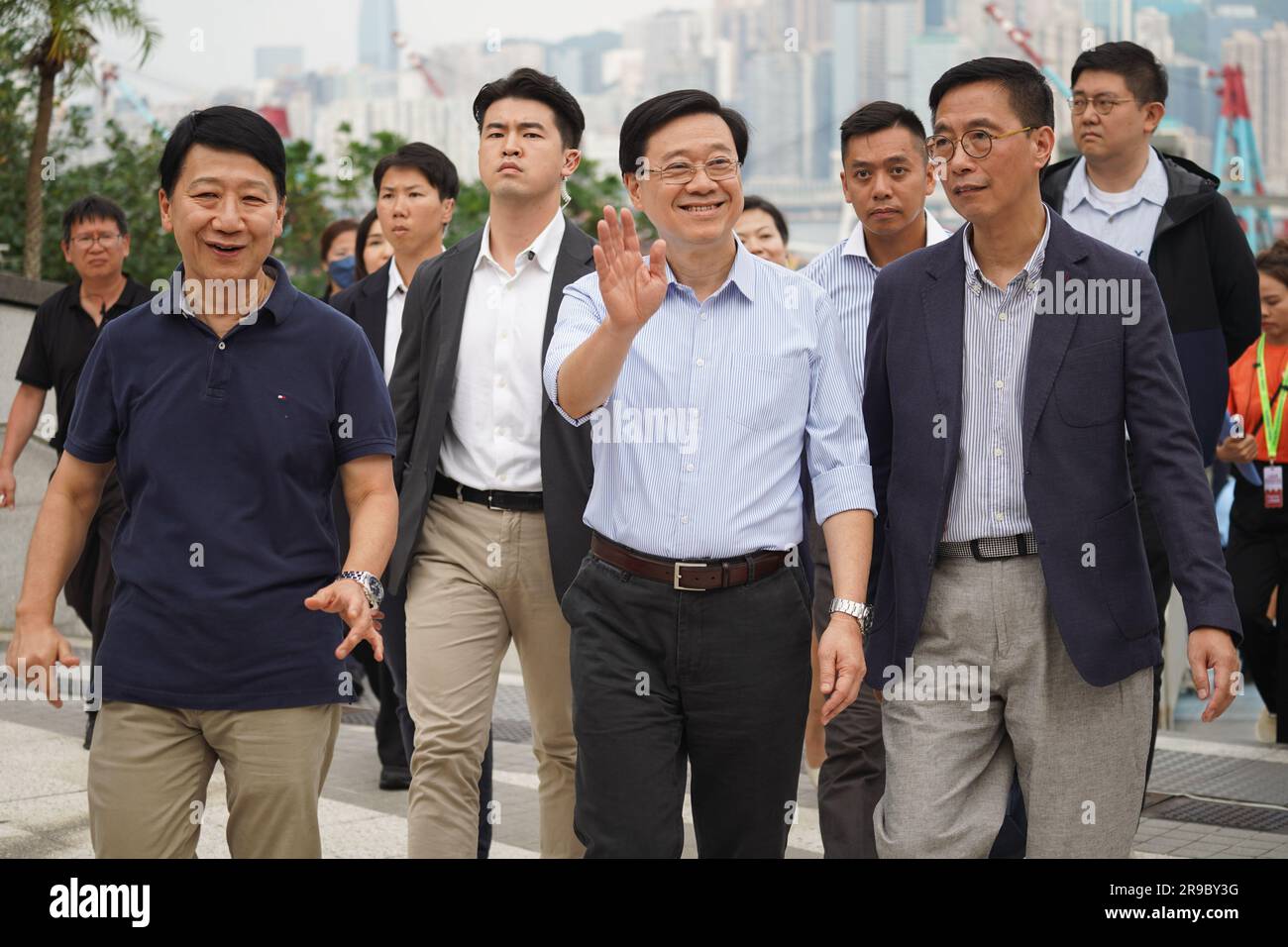John Lee Ka-Chiu (the center one), the Chief Executive of Hong Kong ...