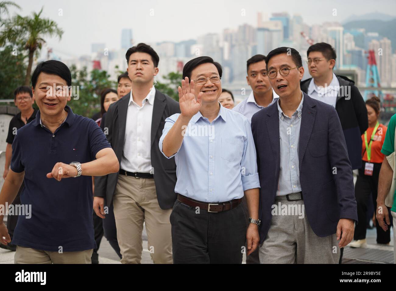 John Lee Ka-Chiu (the center one), the Chief Executive of Hong Kong ...