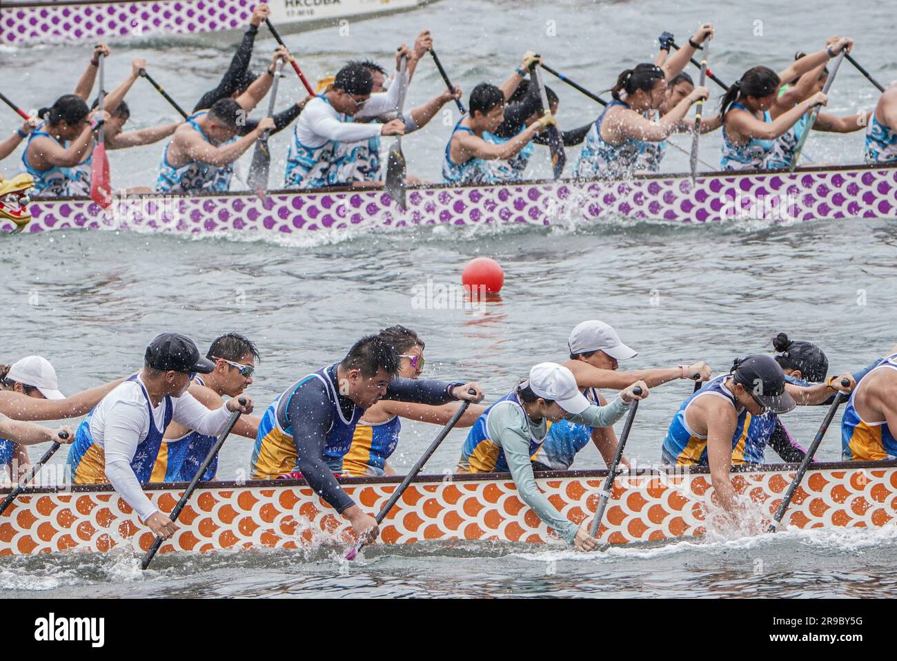 Participants compete in a dragon boat race at the Victoria Harbour. The ...