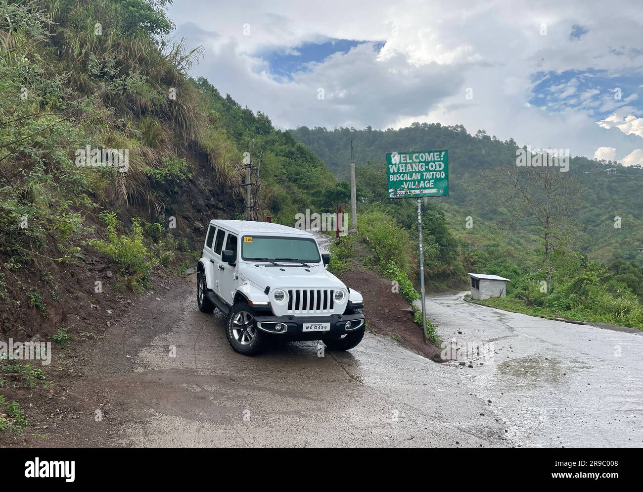 Buscalan, Philippines. 23rd May, 2023. A sign at the turnoff to the ...