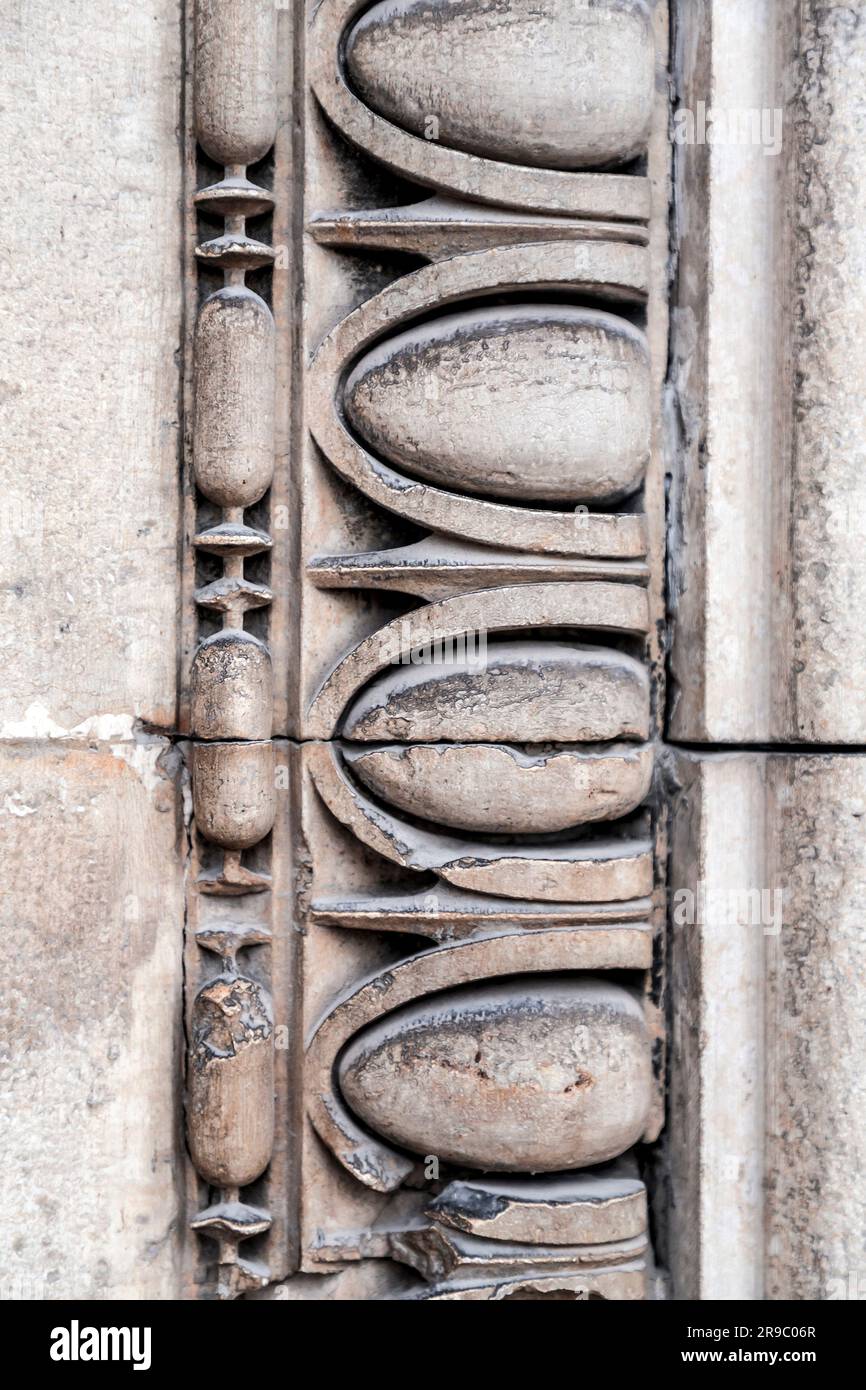 Detail from a wall with ancient Greek style bas relief carvings on ...