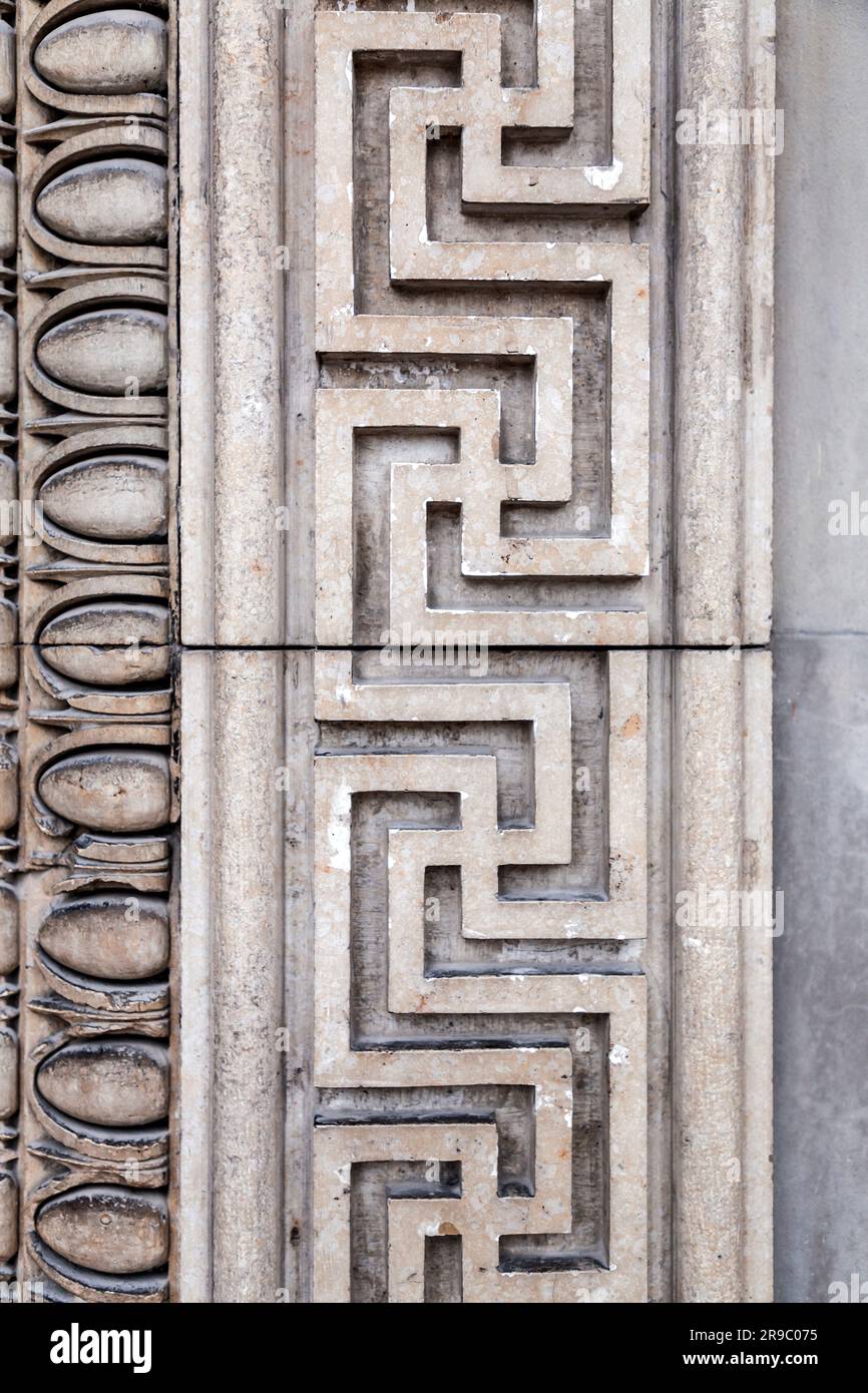 Detail from a wall with ancient Greek style bas relief carvings on ...