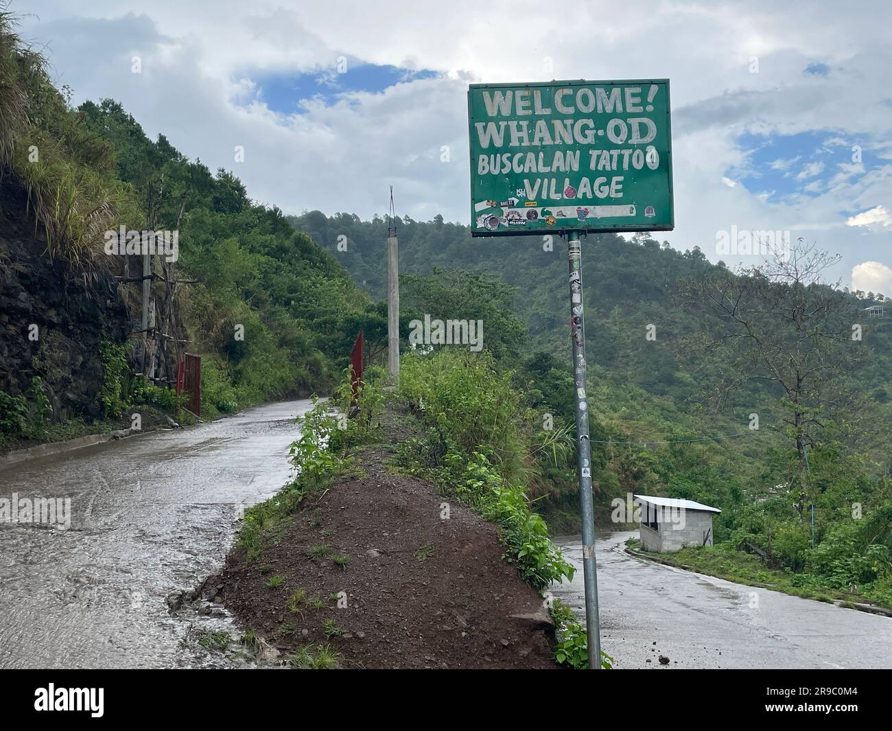 Buscalan, Philippines. 23rd May, 2023. A sign at the turnoff to the ...
