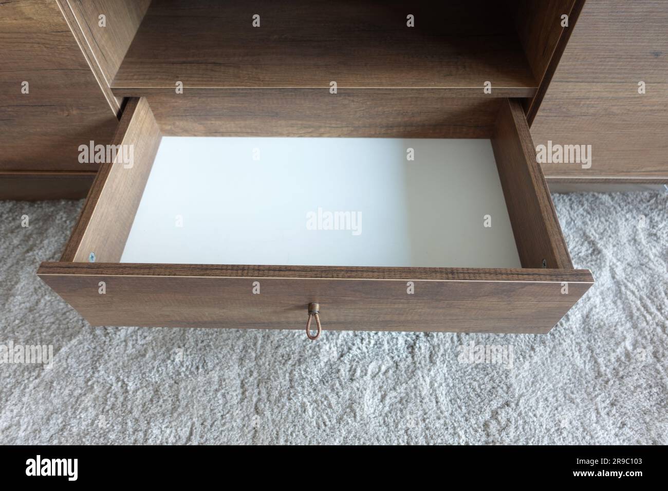 top view of a opened empty drawer Stock Photo - Alamy