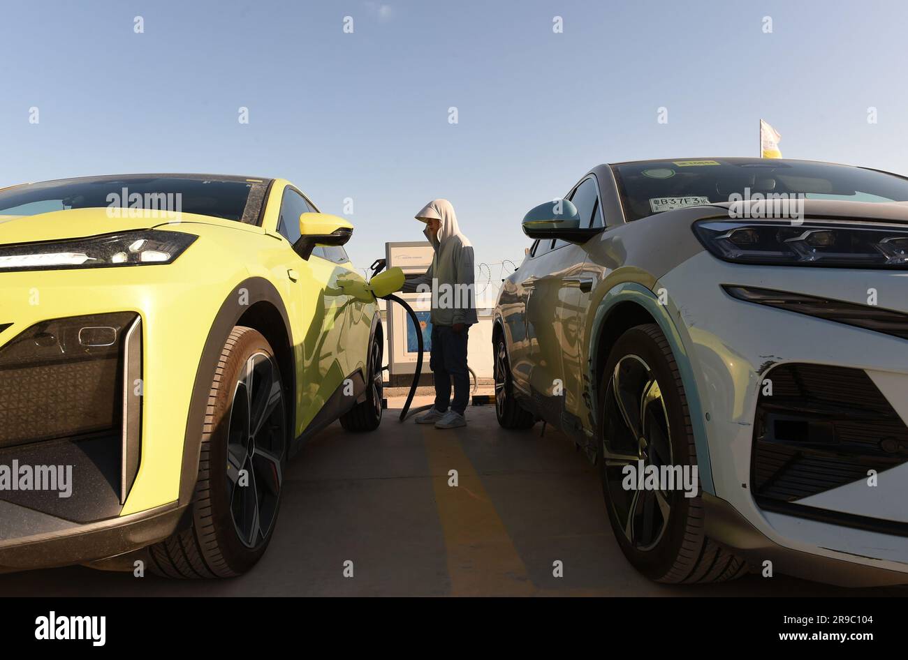 TURPAN, CHINA - JUNE 25, 2023 - Vehicles undergo a charging test at the ...