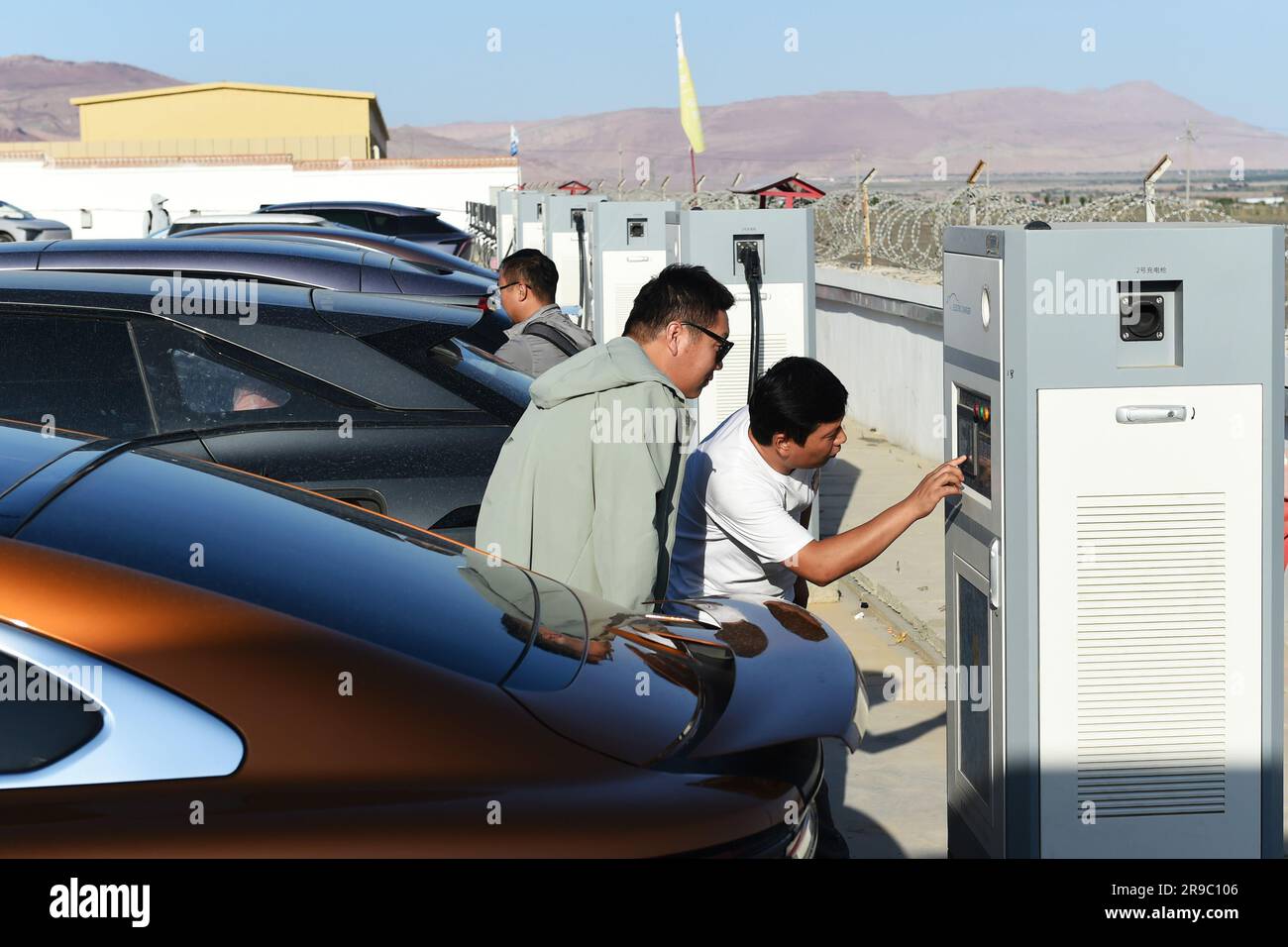 TURPAN, CHINA - JUNE 25, 2023 - Vehicles undergo a charging test at the ...
