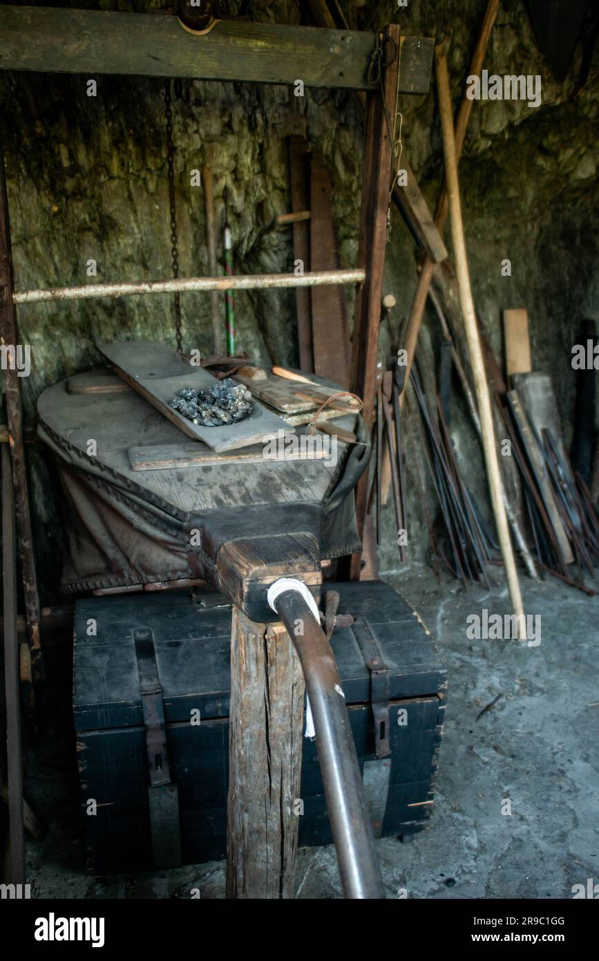 View of traditional blacksmith's shop for forging medieval iron, with ...