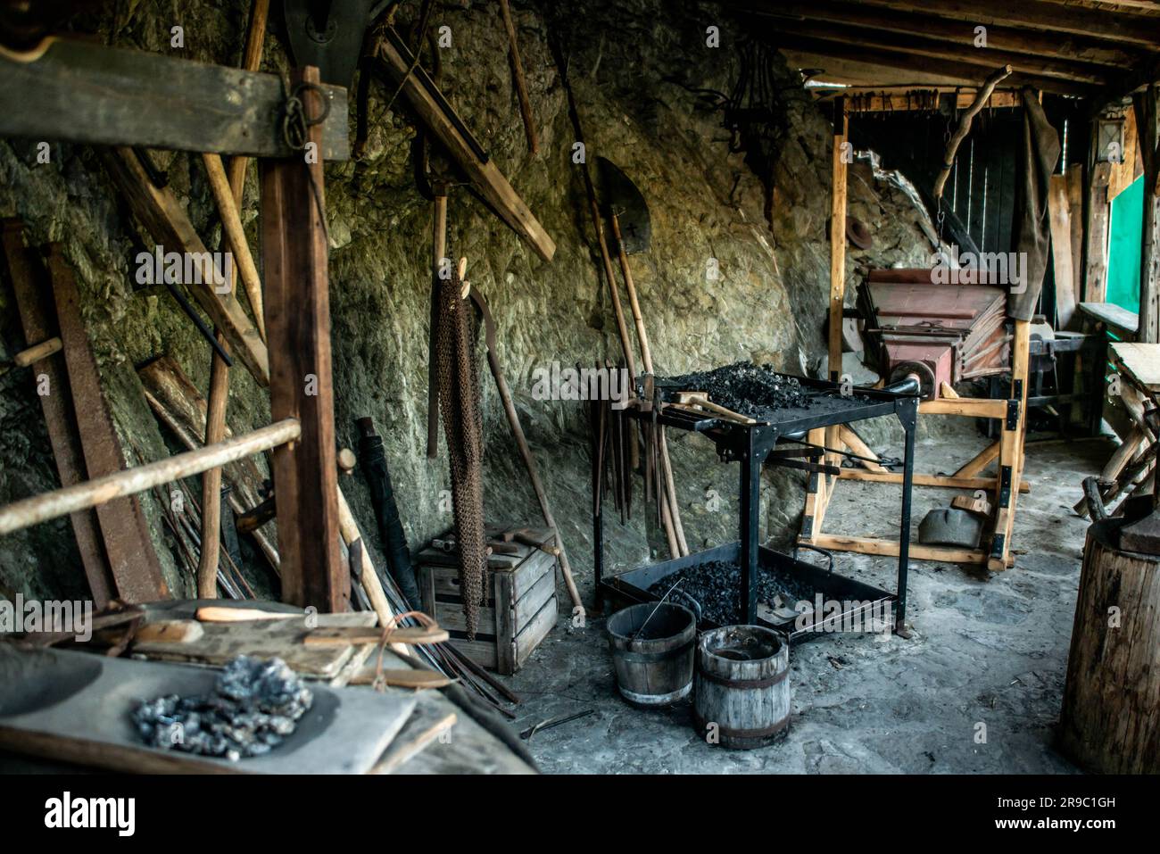 View of traditional blacksmith's shop for forging medieval iron, with ...