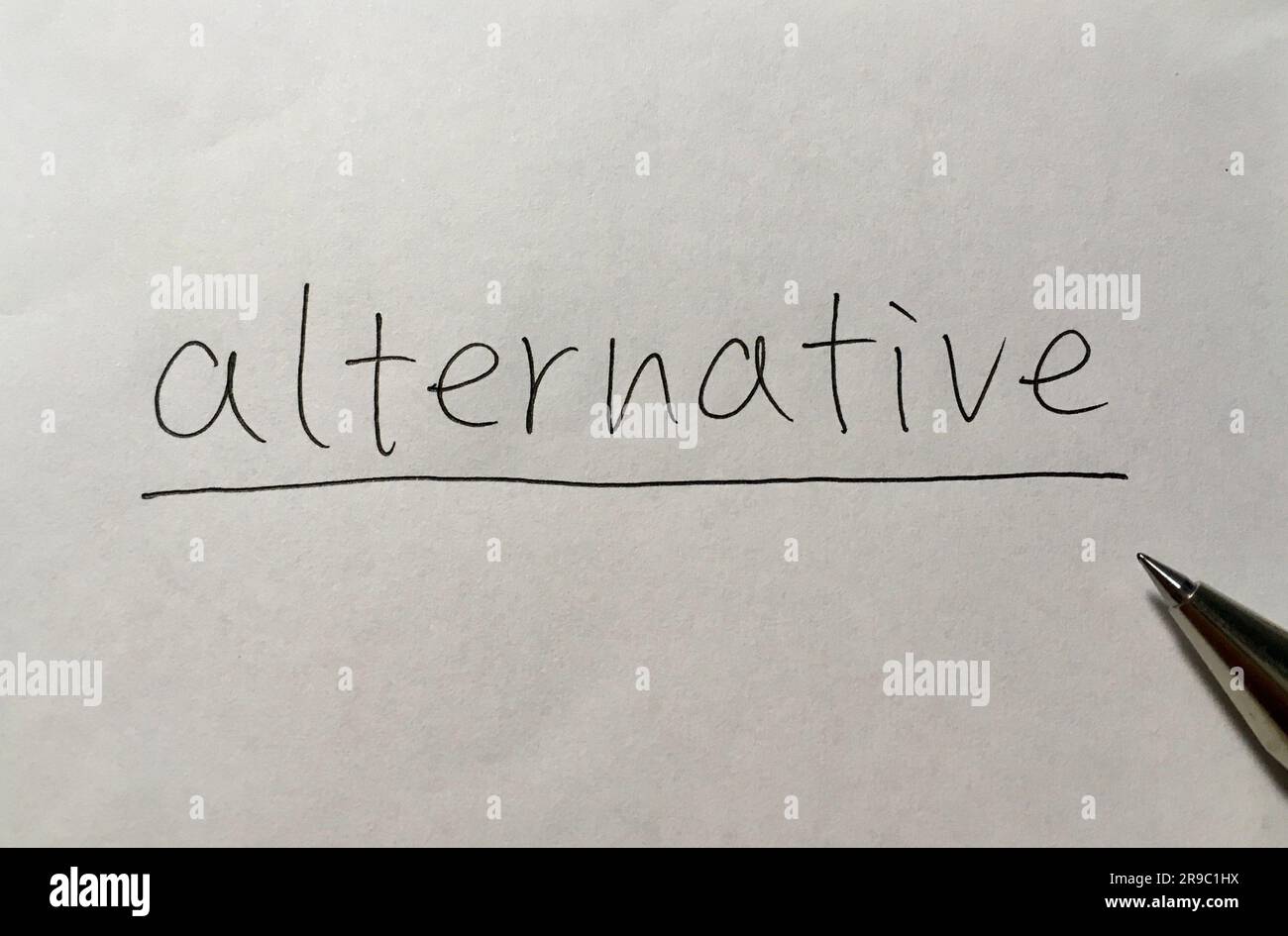 Alternative concept word on paper background Stock Photo - Alamy