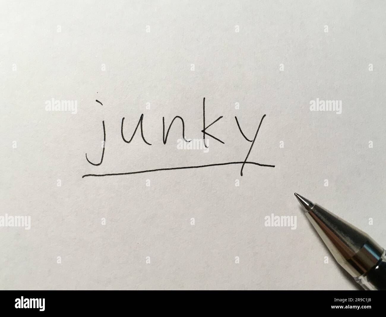 Junky concept word on paper background Stock Photo - Alamy