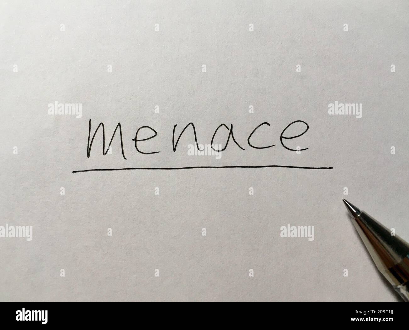 Menace concept word on paper background Stock Photo - Alamy