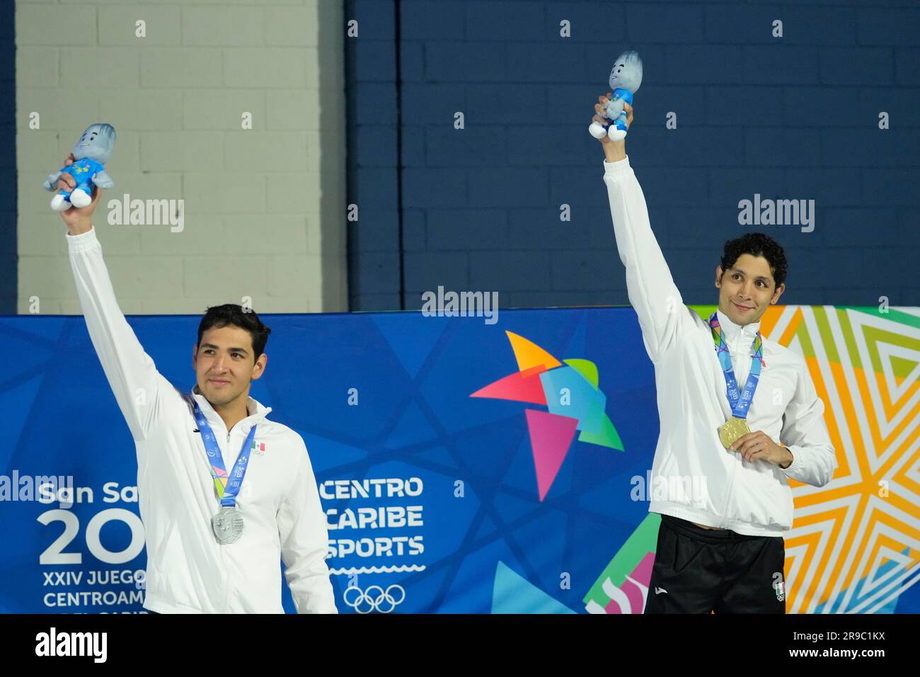 Mexico's silver medalist Andres Puente, left, and gold medalist Miguel ...