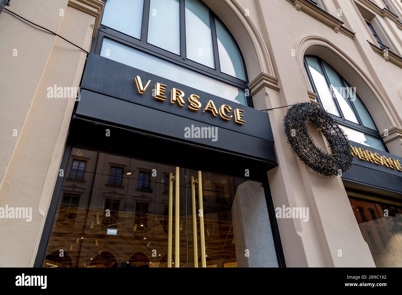 Munich, Germany - December 25, 2021: Versace brand sign and logo at the ...