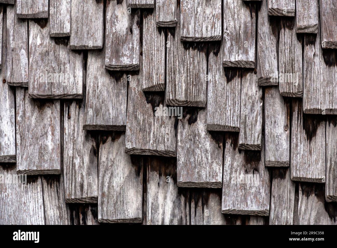 Close up texture background of a wall covered with wooden chunky ...