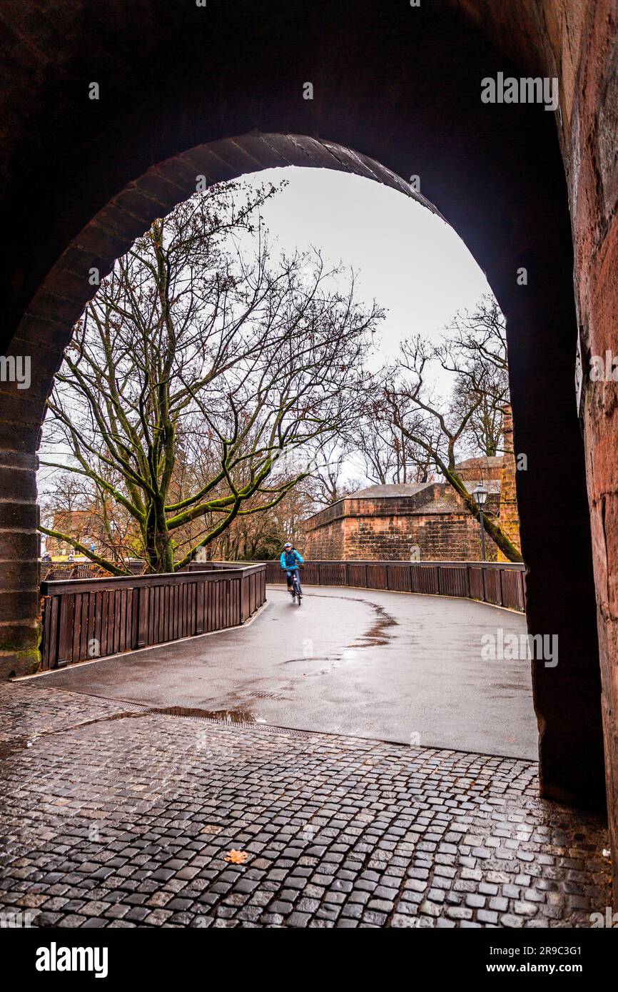 Stone arch gate way through the Nuremberg Castle in the old town of ...