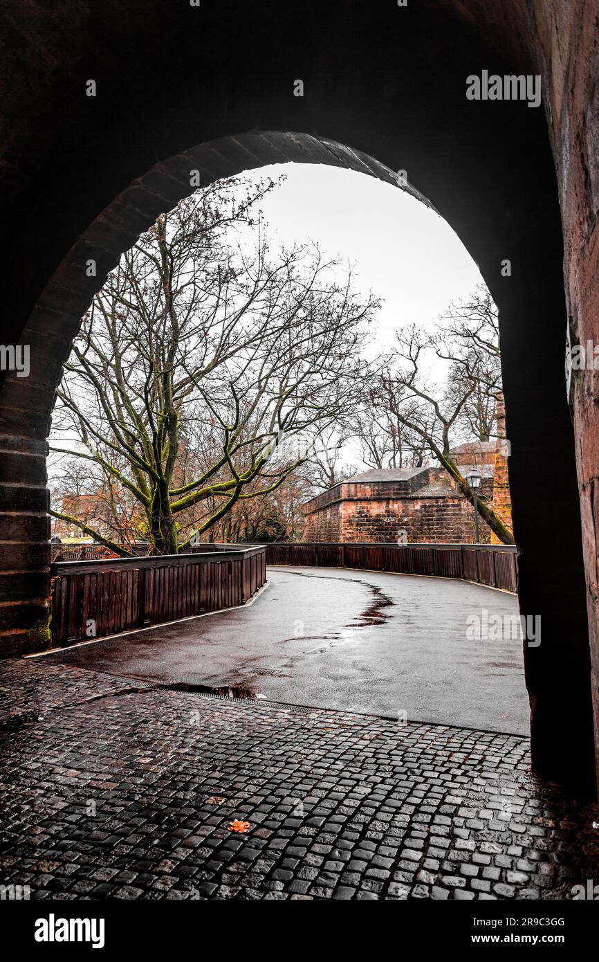 Stone arch gate way through the Nuremberg Castle in the old town of ...
