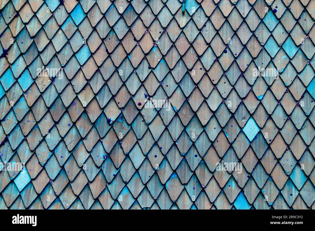 Wall fragment with medieval ceramic tiles in diamond scale shape ...