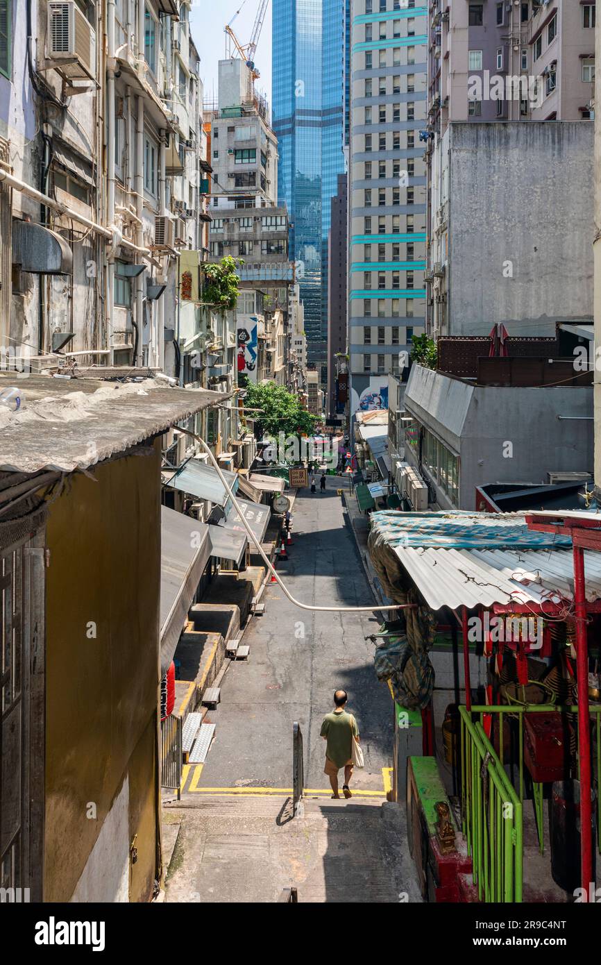 Street market, steep slope, tall buildings landscape, mid levels, Hong ...