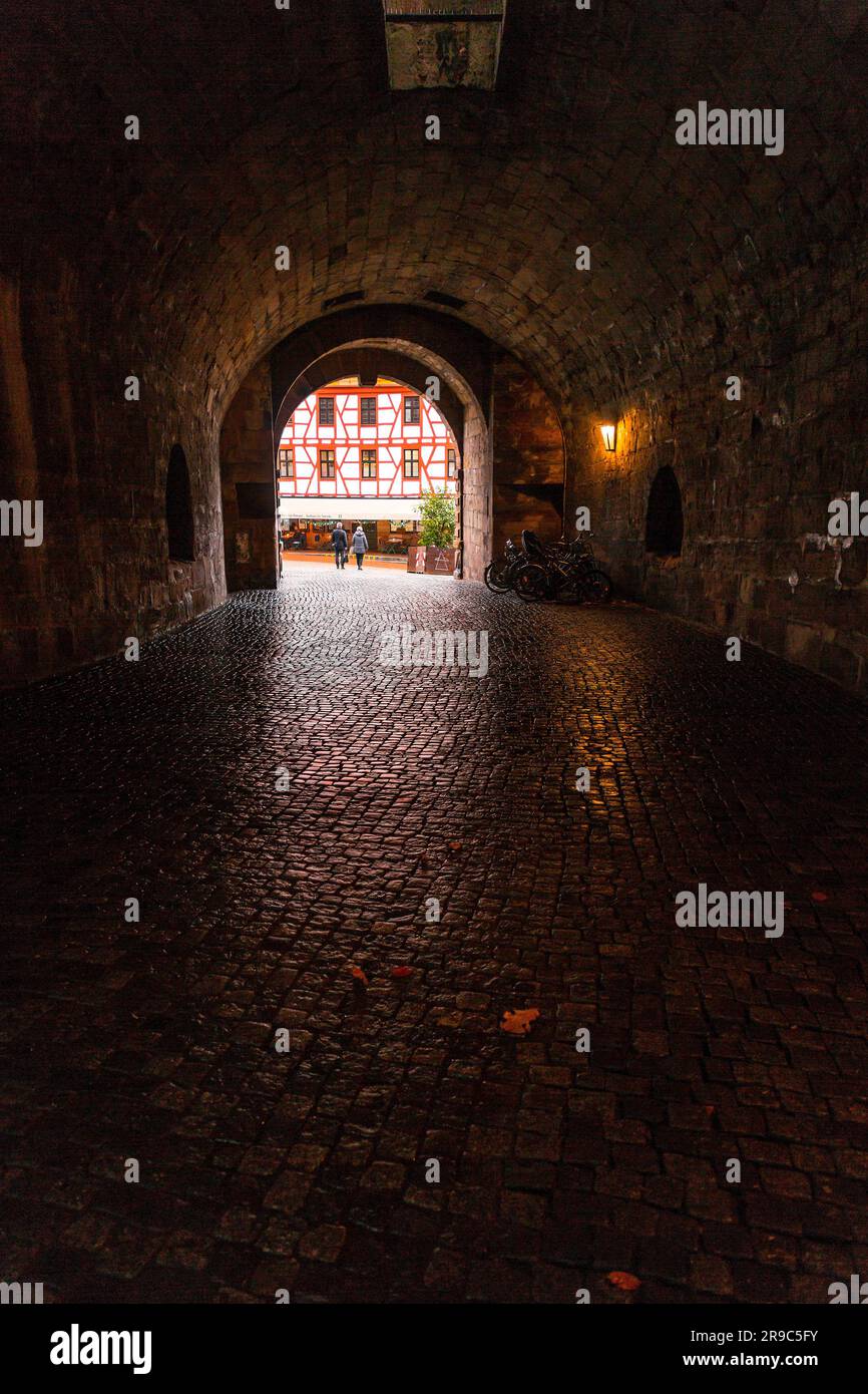 Nuremberg, Germany - December 28, 2021: Stone arch gate way through the ...