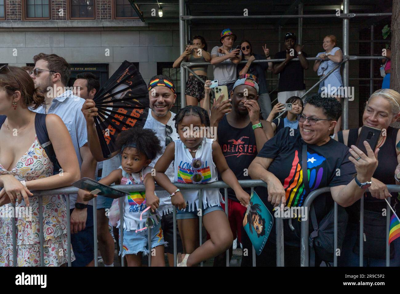 NEW YORK, NEW YORK - JUNE 25: Spectators watch the annual New York City ...