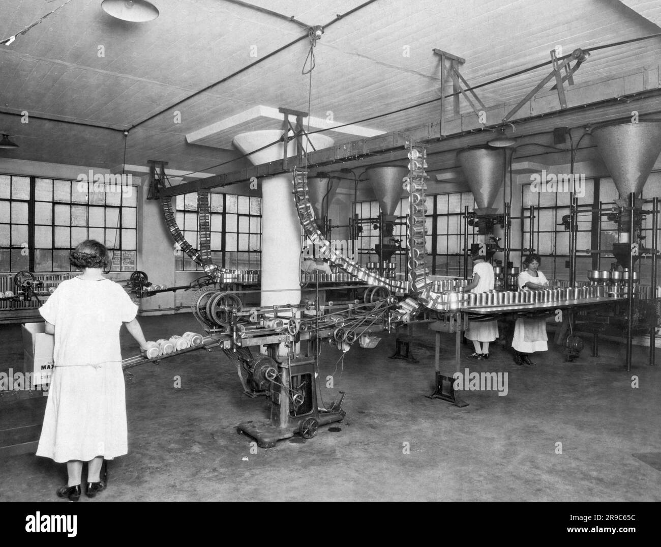 United States: c. 1918 Women employees filling, sealing, and labeling ...