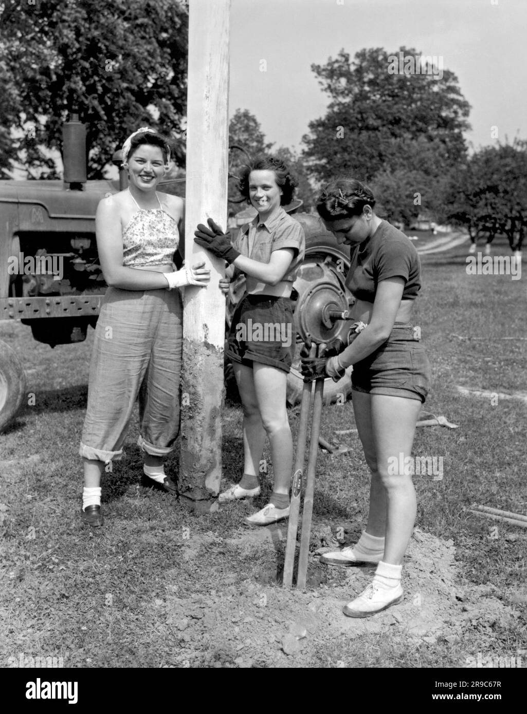 Wheaton, Maryland: June, 1945. Three women at work digging a hole for a ...