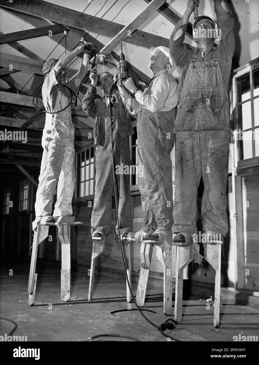Fort Lewis, Washington: November 4, 1942 Electicians working on ...