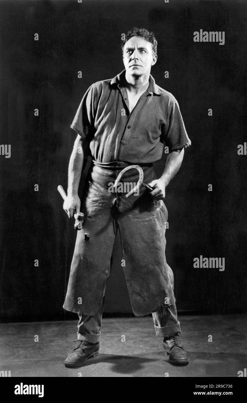 Hollywood, California: 1922 Actor House Peters as a blacksmith in the ...