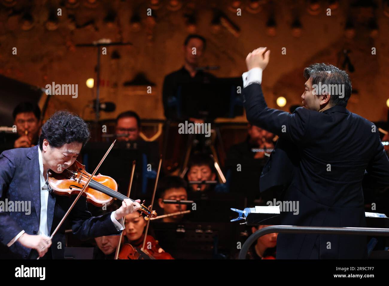 BEIJING, CHINA - JUNE 25, 2023 - Violinist Lu Siqing (left) and ...