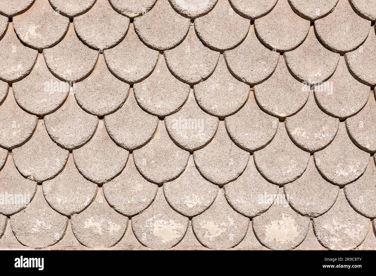 Carved fish scale stone wall close up texture background, textured and ...
