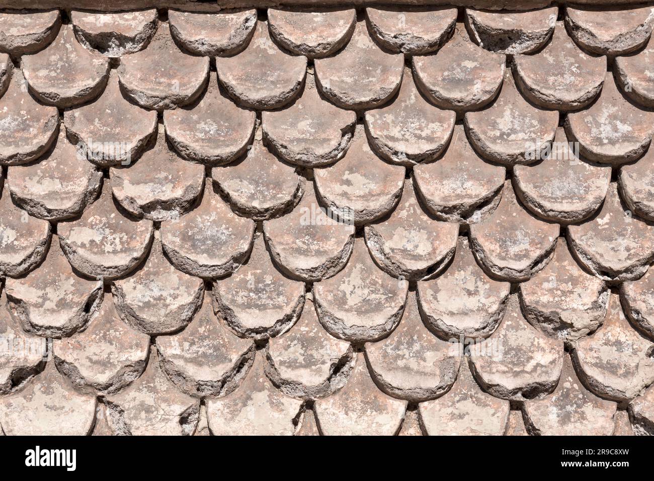 Carved fish scale stone wall close up texture background, textured and ...