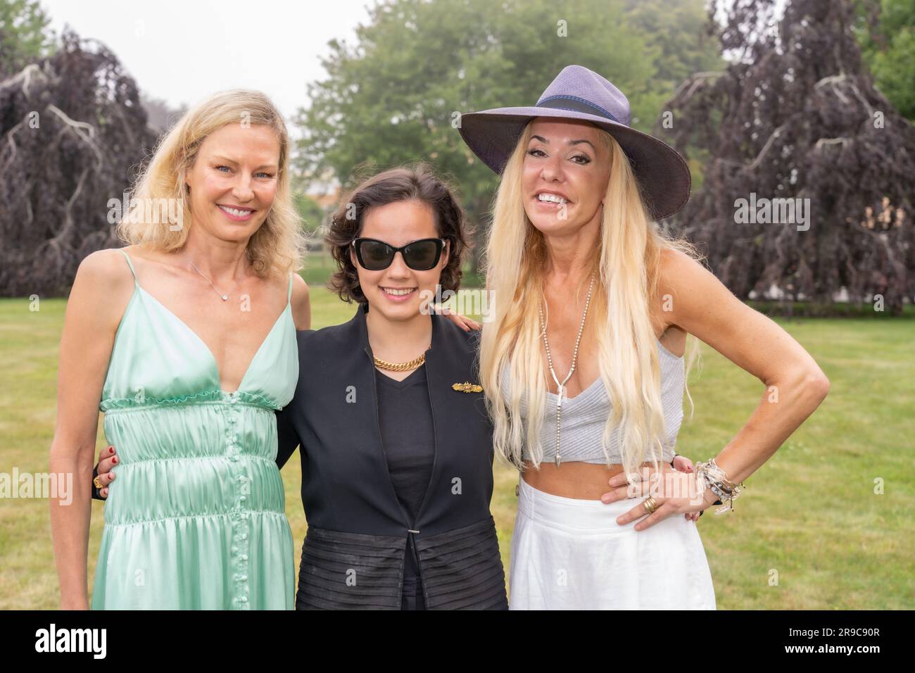 Missy Hargraves, Elena Gibbs and Luciana Pampalone attend the Evelyn ...