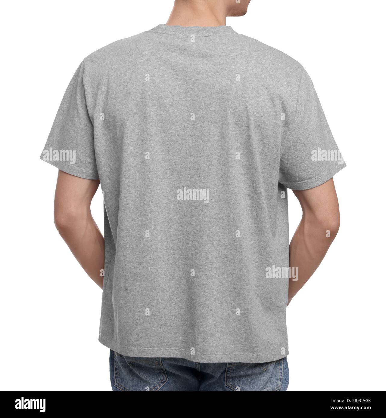 Young man wearing grey t-shirt on white background, back view Stock ...