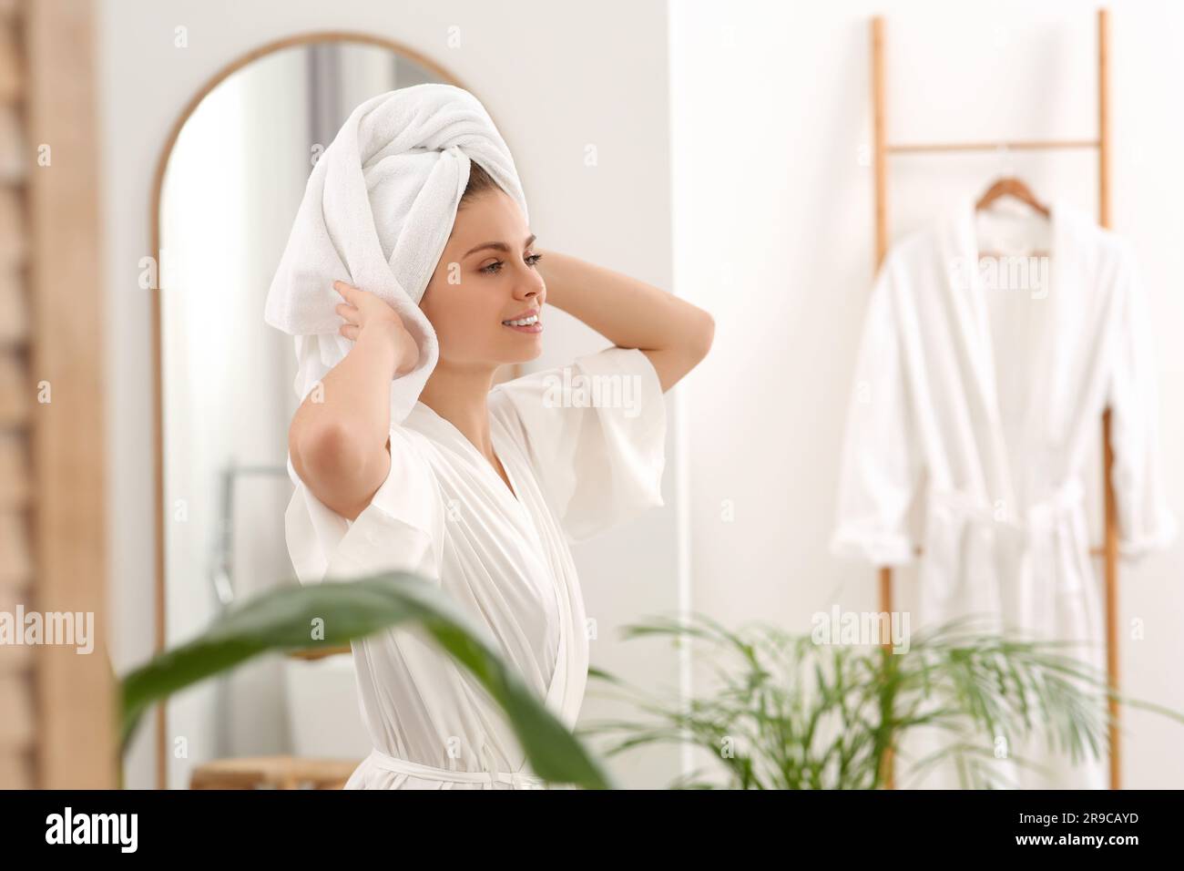 Young woman in light robe hi-res stock photography and images - Alamy