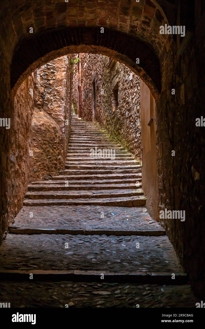 Beautiful streets of Girona old town with ancient buildings and ...