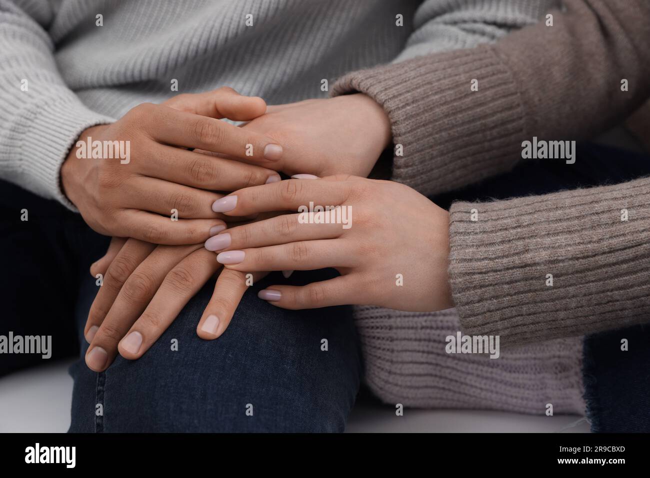 Dating agency. Couple holding hands together, closeup view Stock Photo ...