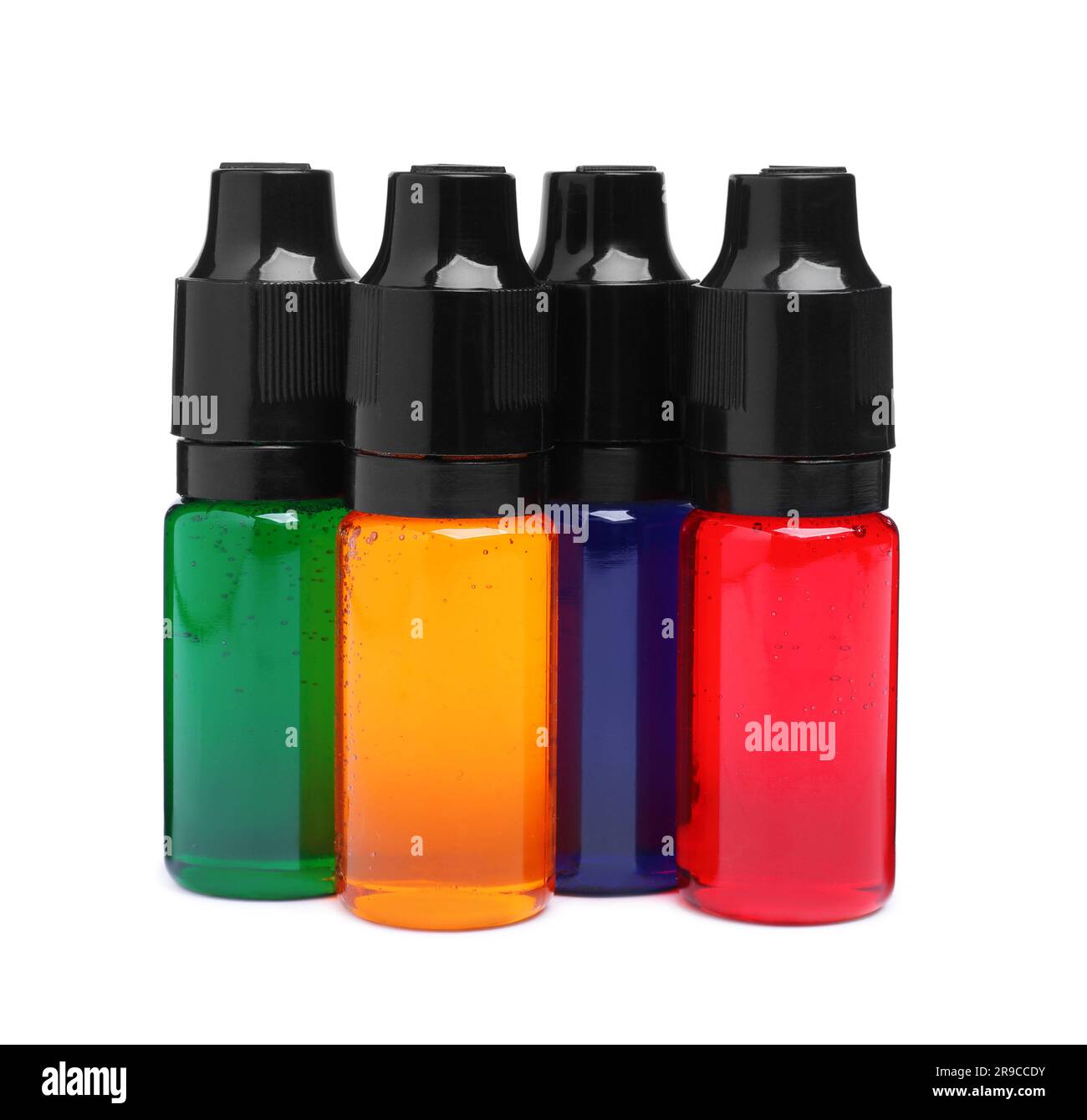 Bottles with different food coloring on white background Stock Photo ...