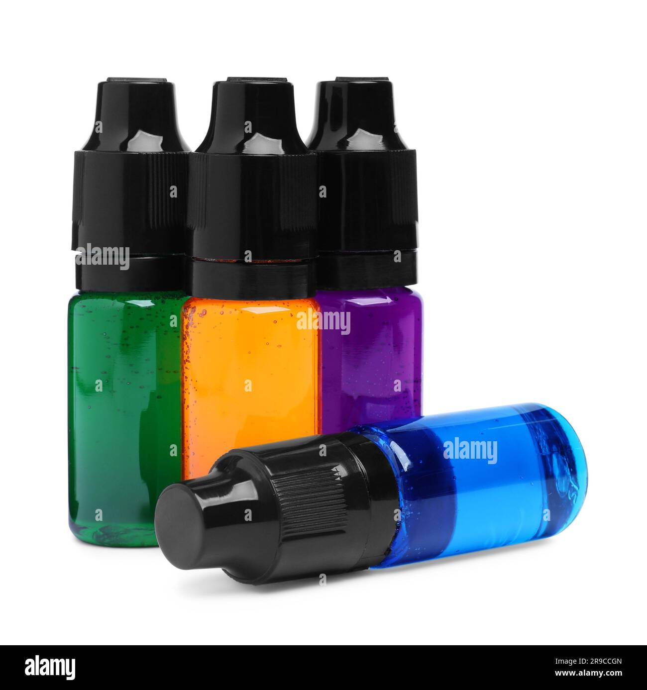 Bottles with different food coloring on white background Stock Photo ...