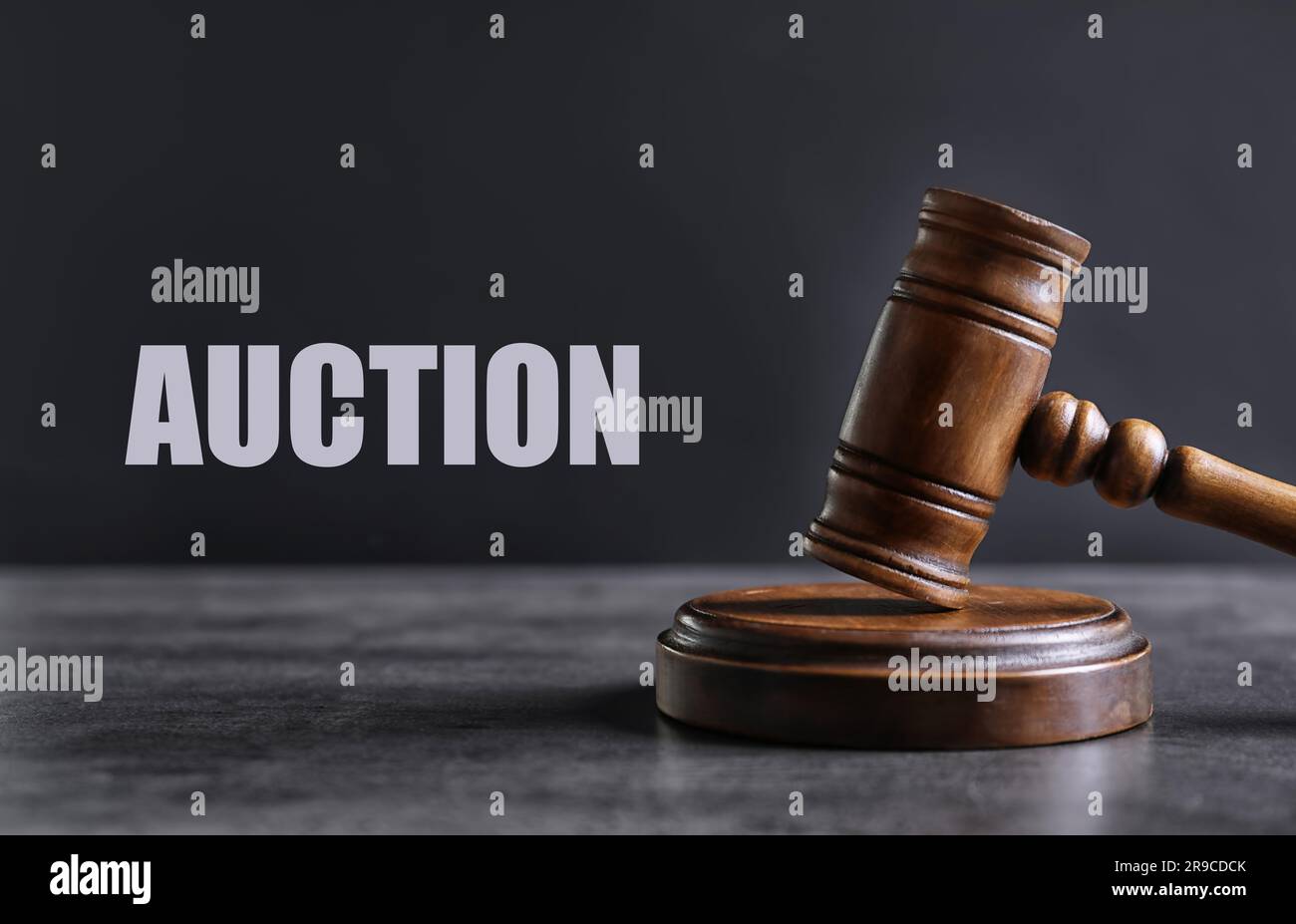 Auction. Wooden gavel on grey textured table Stock Photo - Alamy