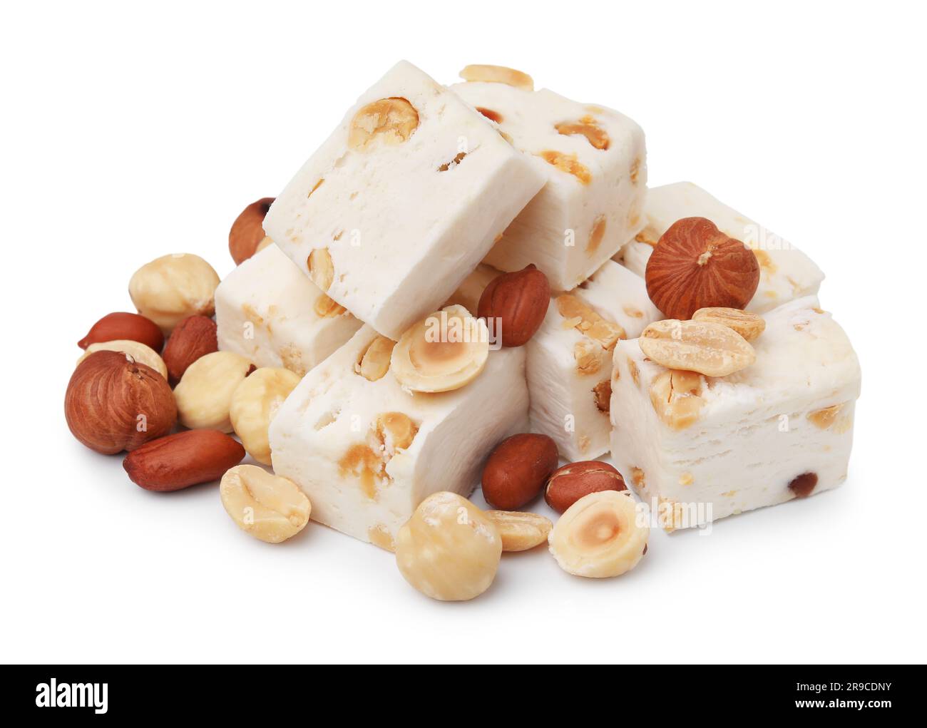 Pieces of delicious nougat and nuts on white background Stock Photo - Alamy