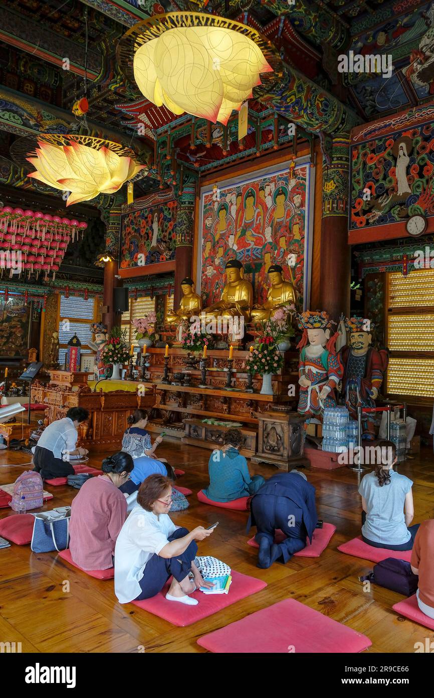 Seoul, South Korea - June 24, 2023: People praying in the Bongeunsa ...