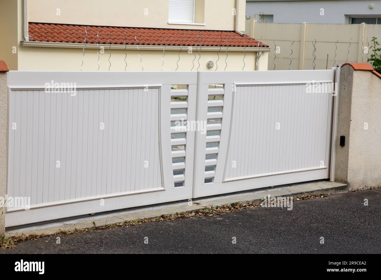 pvc plastic modern gate portal of suburb house door Stock Photo - Alamy