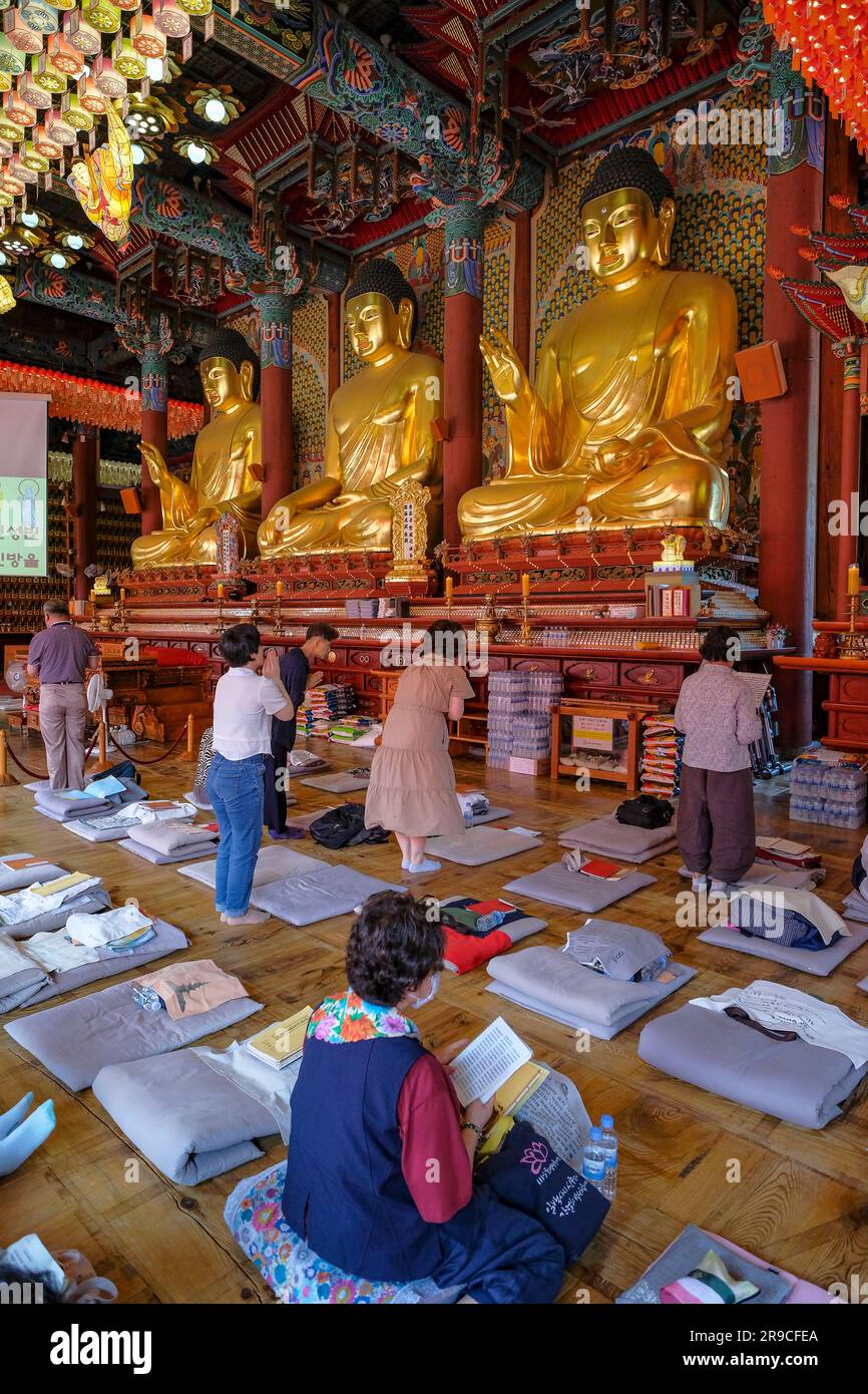 Seoul, South Korea - June 25, 2023: People praying in the Jogyesa ...
