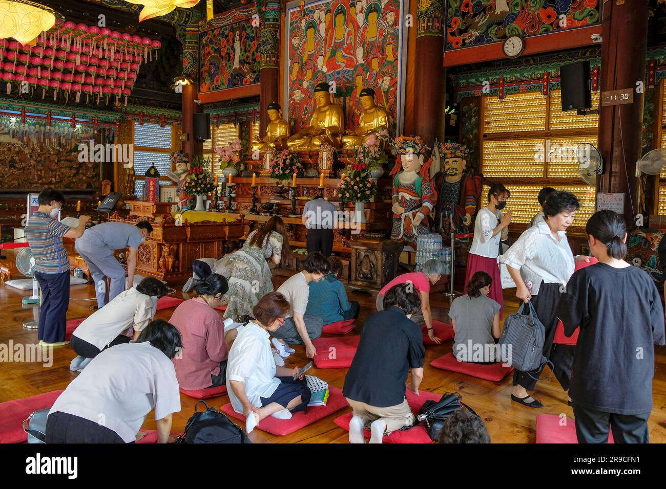 Seoul, South Korea - June 24, 2023: People praying in the Bongeunsa ...